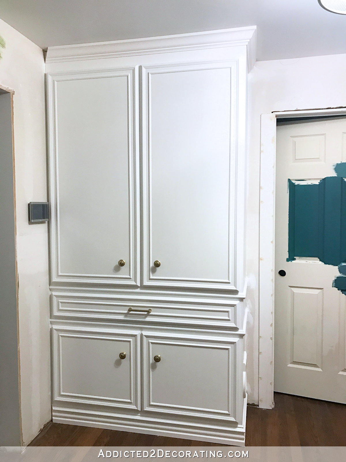 DIY Hallway Cabinets All Painted And Practically Finished
