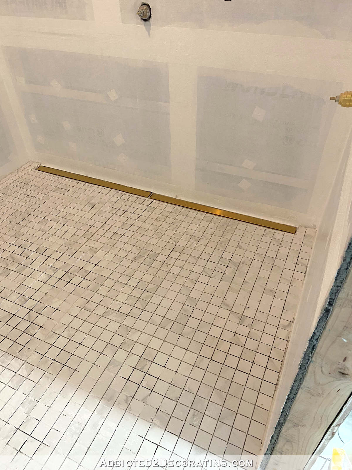 Tiling Our Large Curbless Shower Floor - Addicted 2 Decorating®