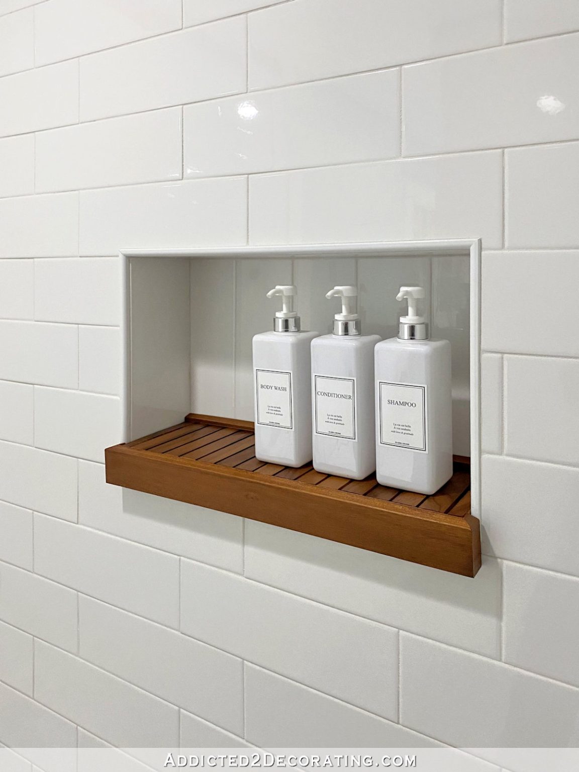 Simple DIY Removable Teak Shower Niche Shelf - Addicted 2 Decorating®